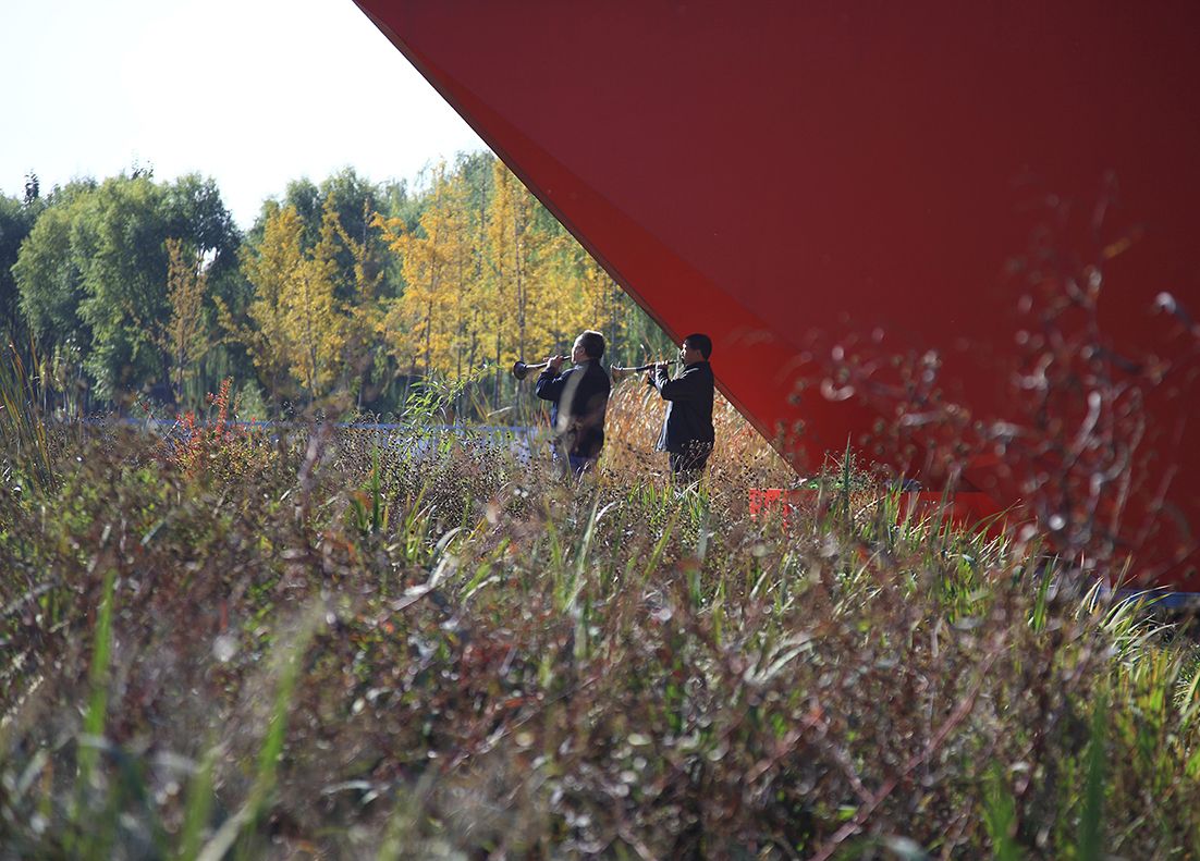 The Red Folding Paper In The Greenway - modlar.com