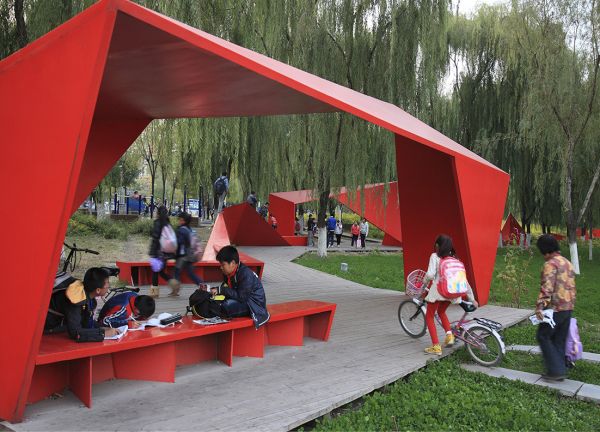 The Red Folding Paper In The Greenway - View of the Walkway - modlar.com