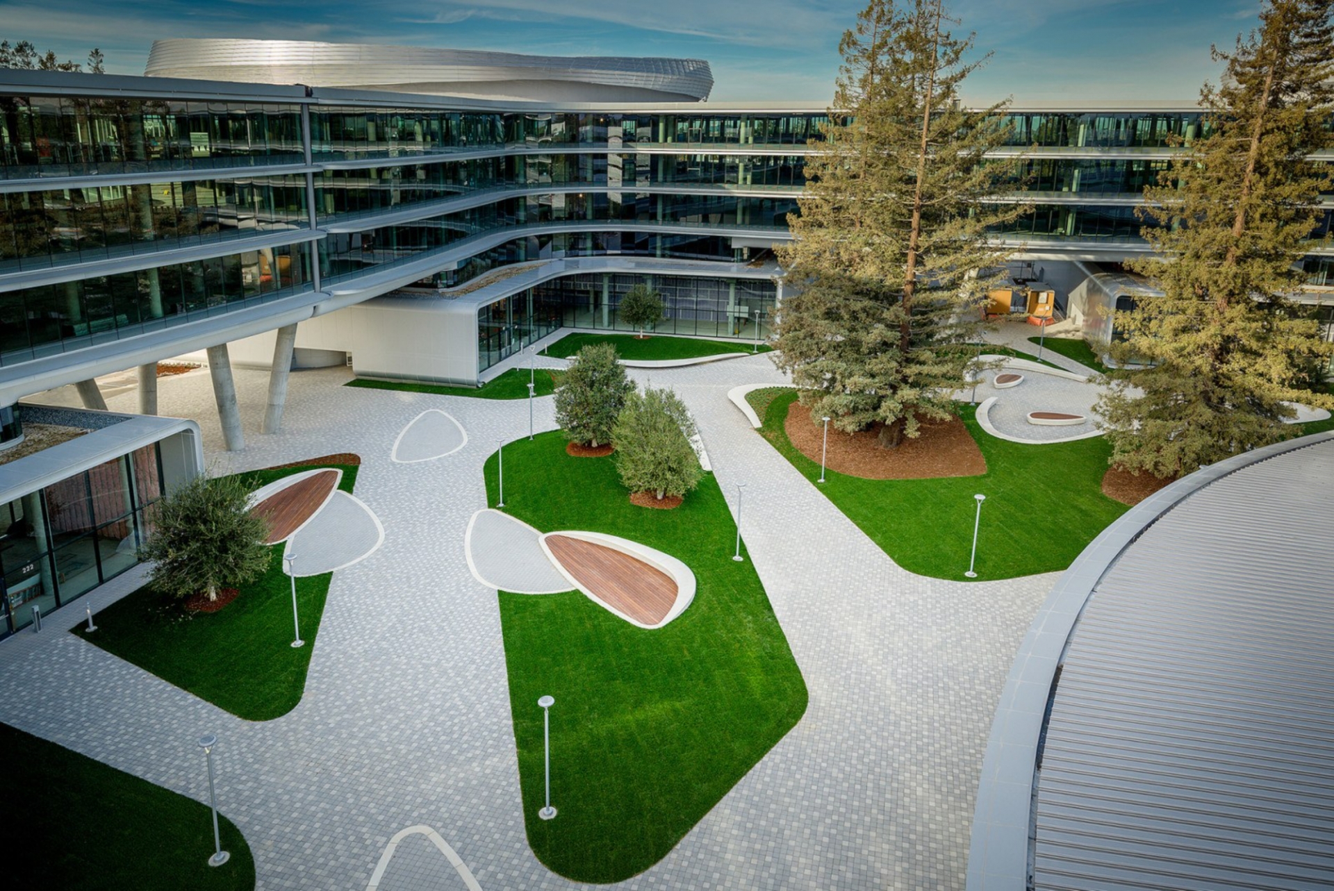 Central + Wolfe Campus - Curved Glass Walls - modlar.com